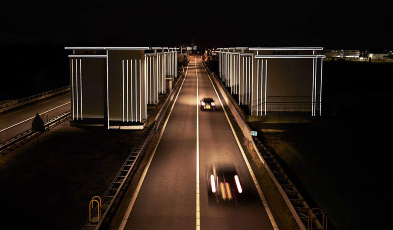 Historic Dutch dike lights up with sustainable art installations ...