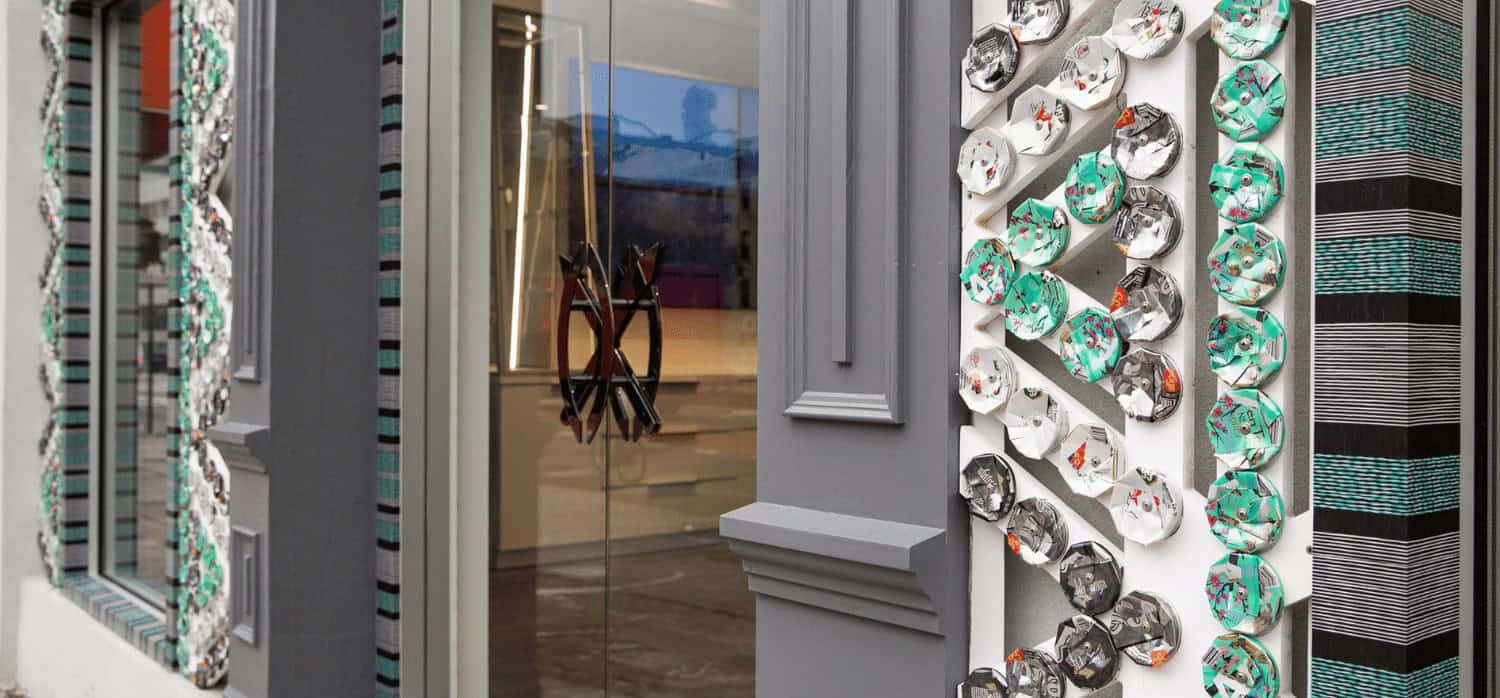 Clothing store incorporates repurposed material, African art into NYC ...